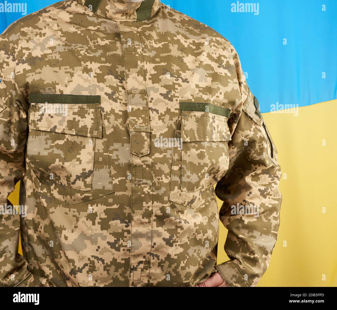 Ukrainian man a warrior dressed in a military pixel uniform stands ...