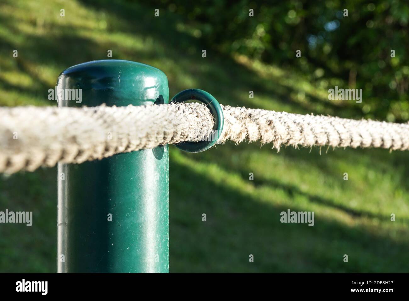 A close up of a board walk wooden post and rope Stock Photo - Alamy