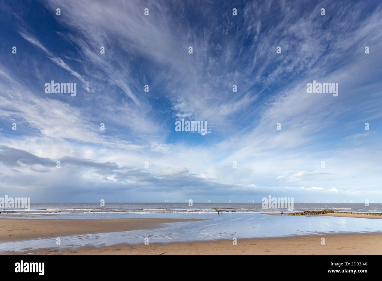 Cirrus clouds over Prestatyn Beach, North Wales coast Stock Photo - Alamy
