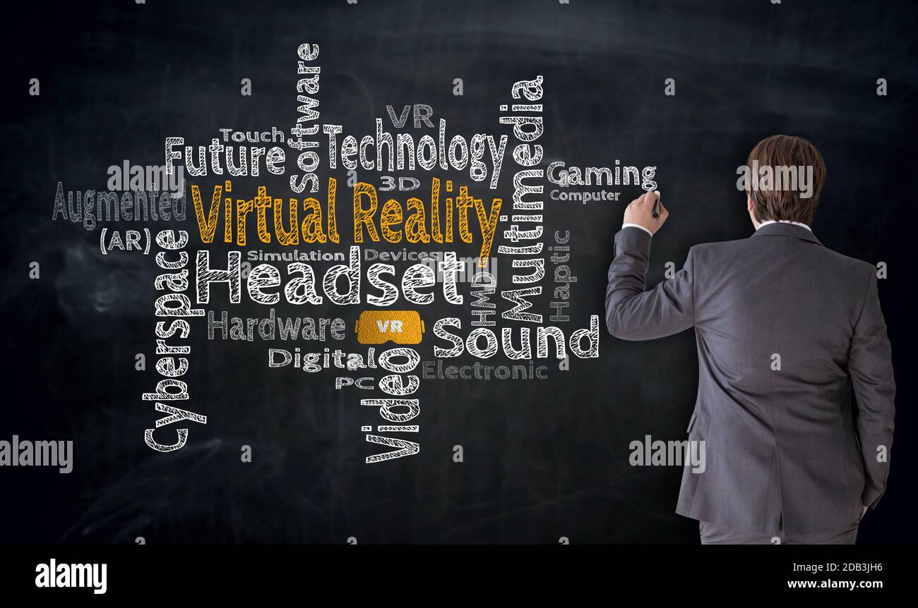 Businessman writes Virtual Reality Cloud on blackboard concept Stock ...