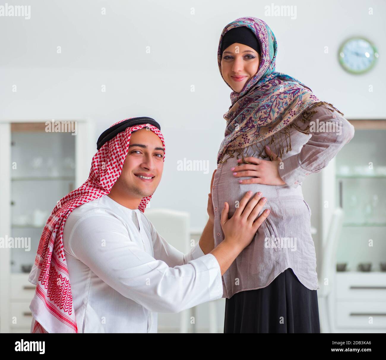 The young arab muslim family with pregnant wife expecting baby Stock ...