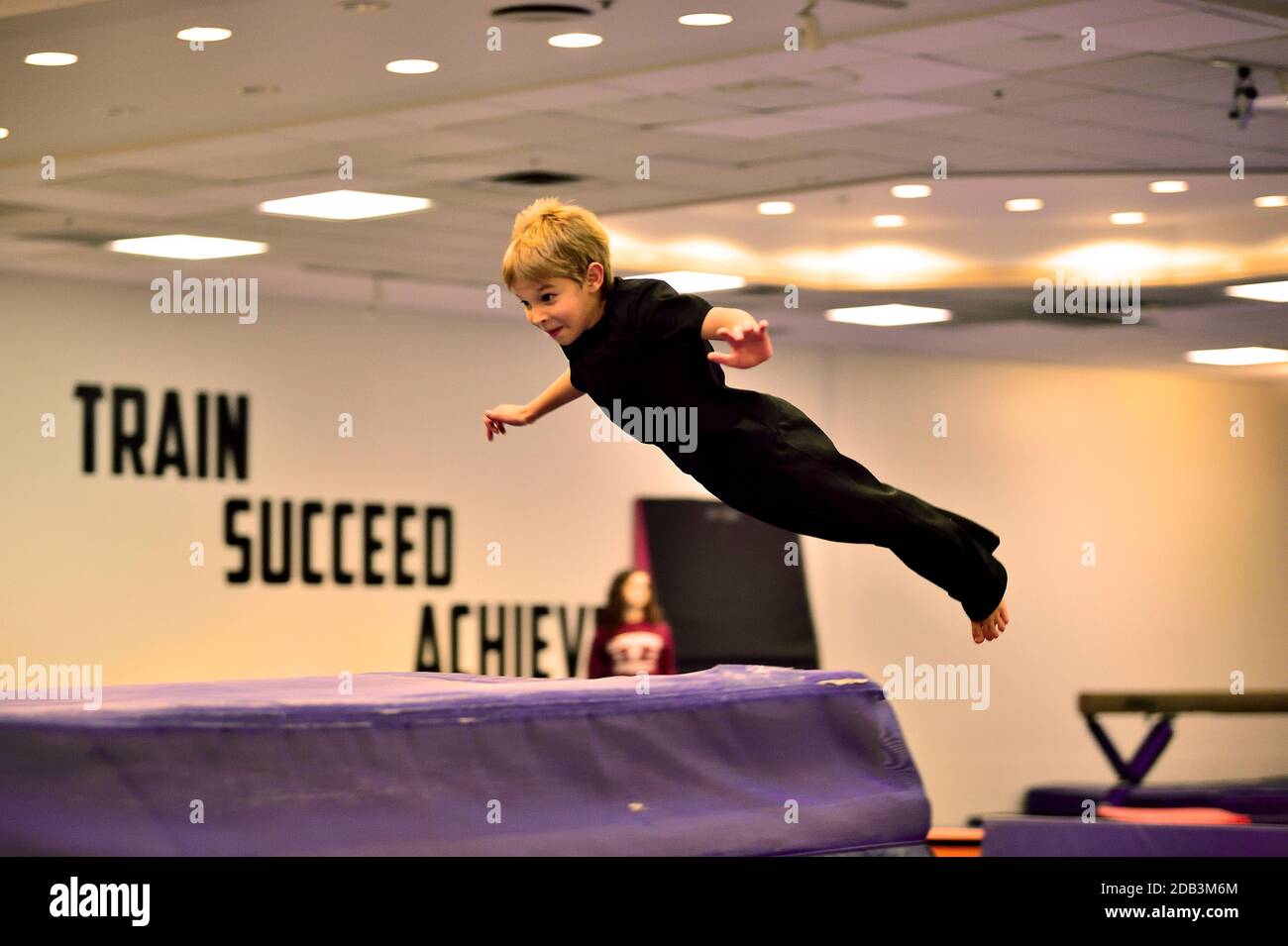 Boys jumping into hi-res stock photography and images - Alamy