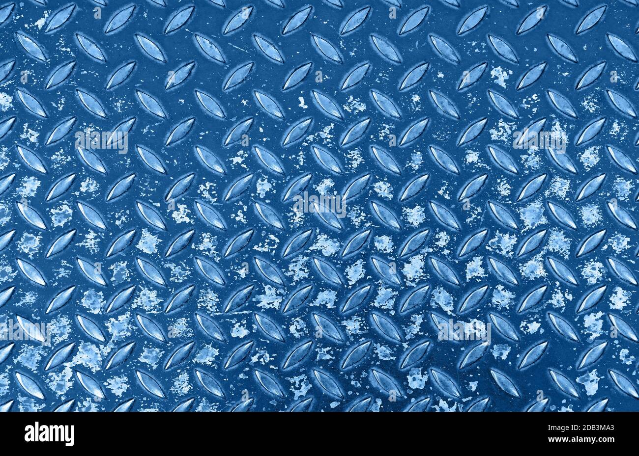 Close up background of dark blue toned industrial anti slip embossed ...