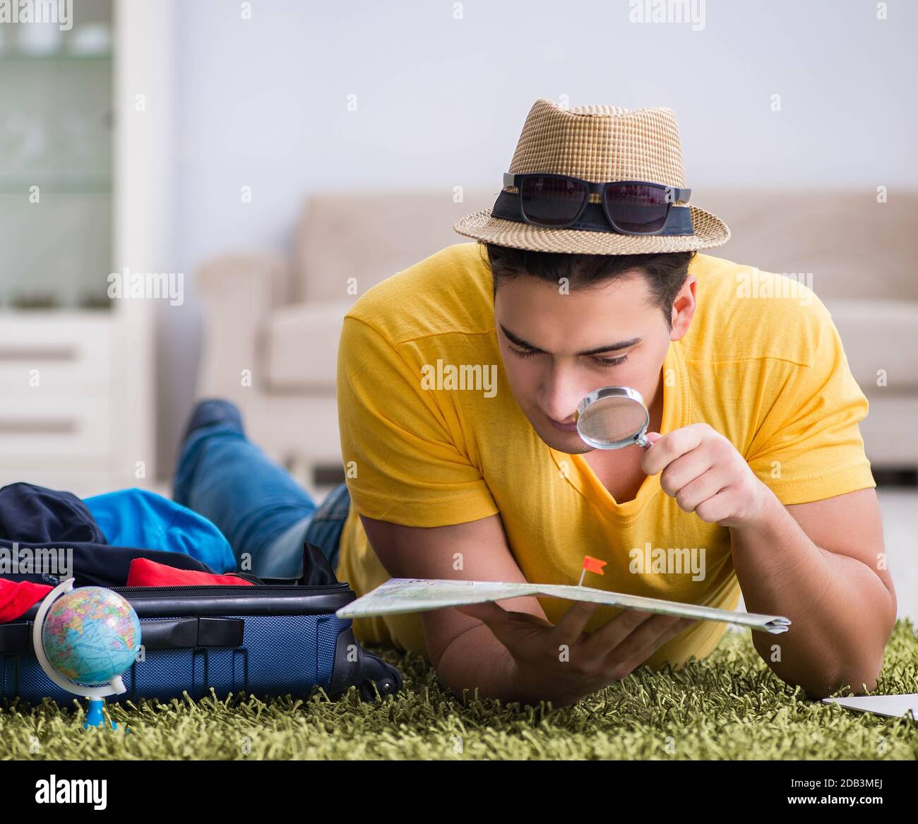 The man planning his vacation trip with map Stock Photo - Alamy