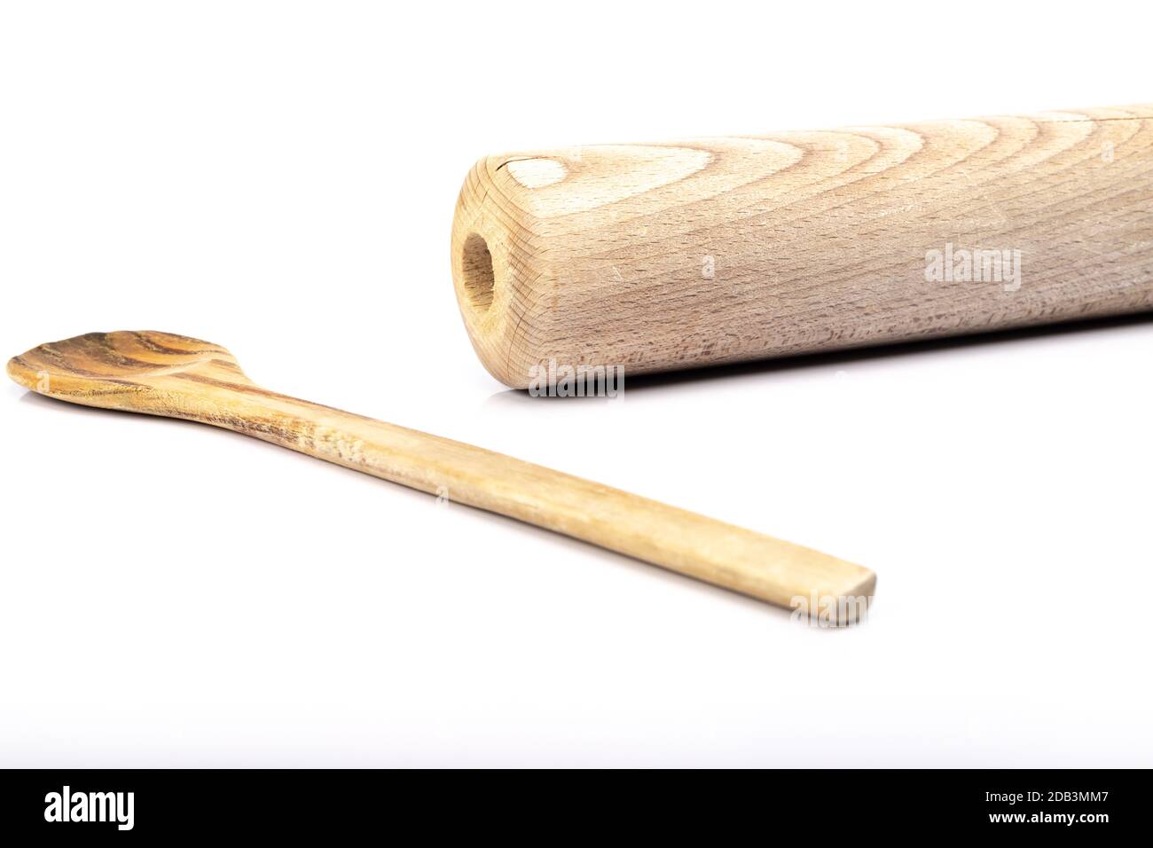 wooden spoon and rolling pin on white background in studio Stock Photo ...