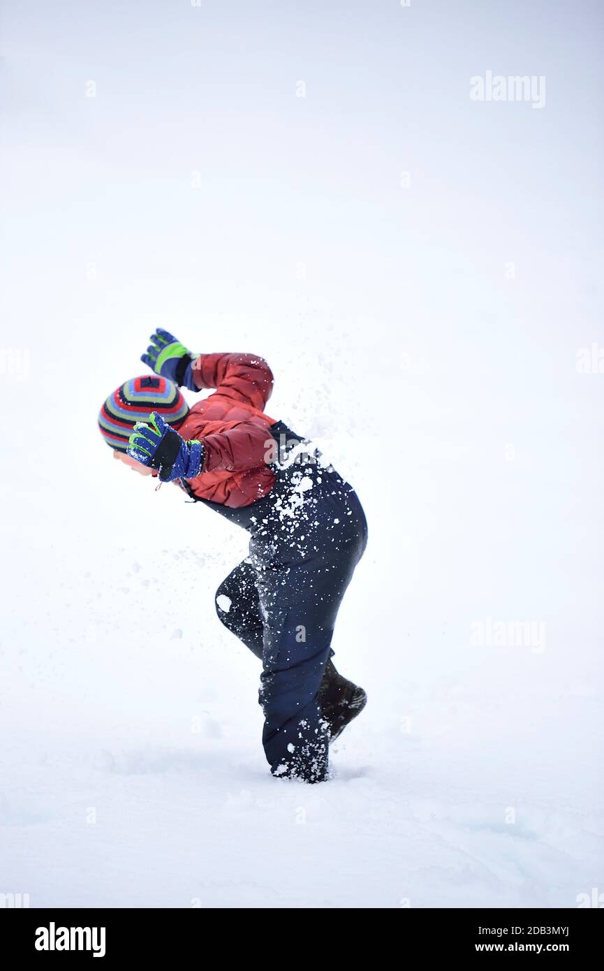 Kids playing on snow hi-res stock photography and images - Alamy