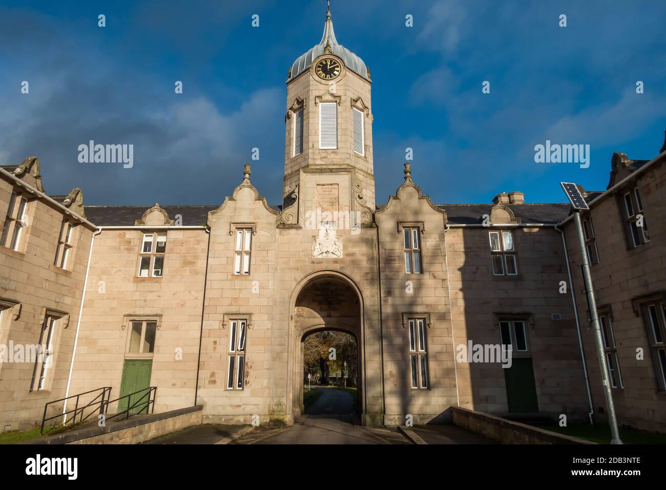 The stone arch of the Simpsons Building in the town of Huntly ...