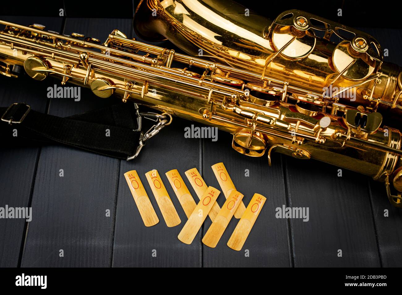 set of reeds to place in the mouth piece of a saxophone Stock Photo - Alamy