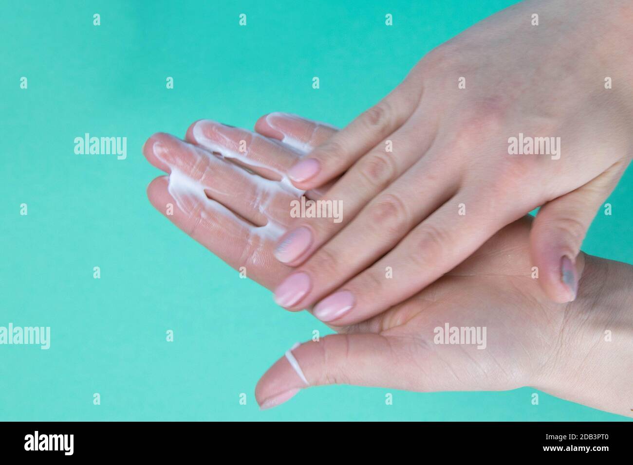 Women's hands rub disinfectant gel in hand. Top views Stock Photo - Alamy