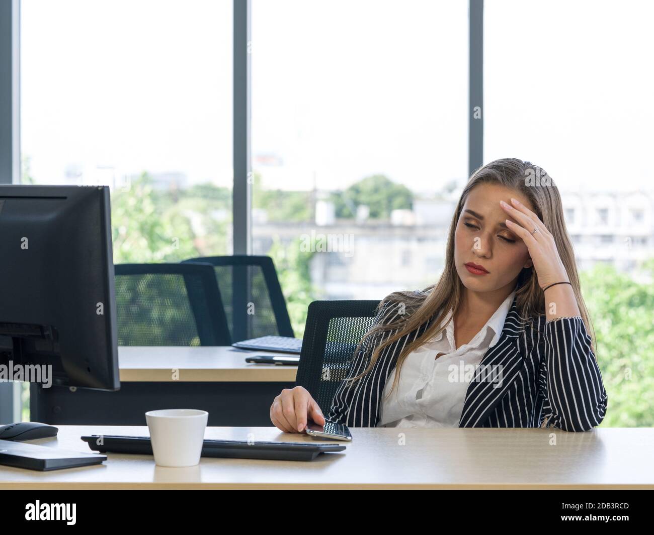 Morning work atmosphere In a modern office. Teen employees rest their ...