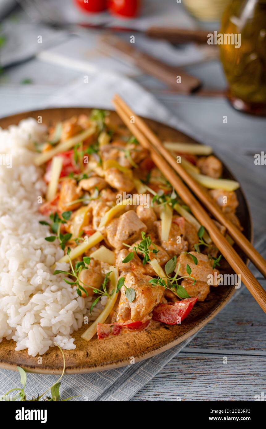 Spicy and hot red curry with vegetable, meat and rice Stock Photo - Alamy
