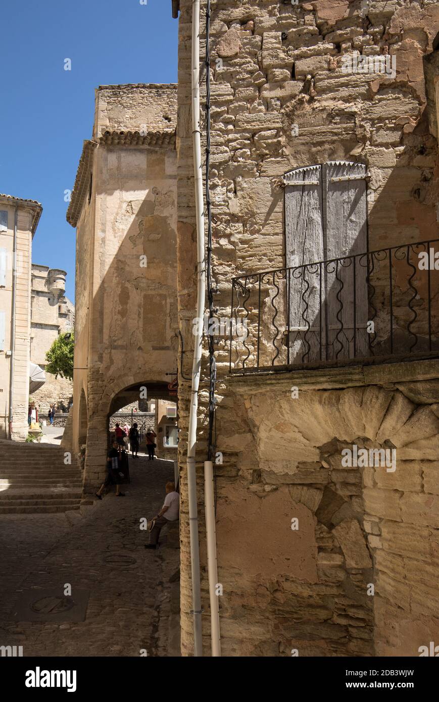 Narrow street in medieval town Gordes. Provence, France Stock Photo - Alamy