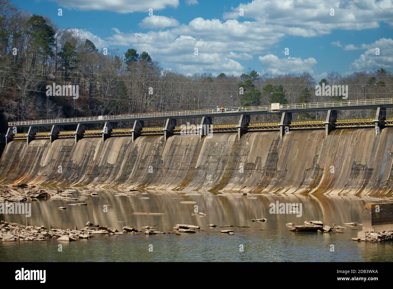 An old concrete hydroelectric dam in a wide river Stock Photo - Alamy
