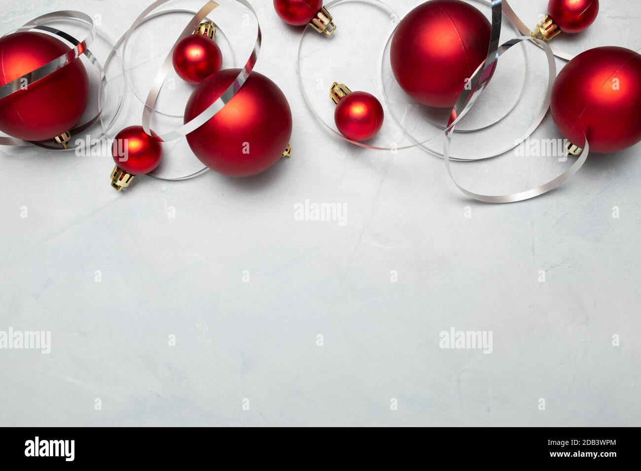 Christmas balls on gray background Stock Photo - Alamy