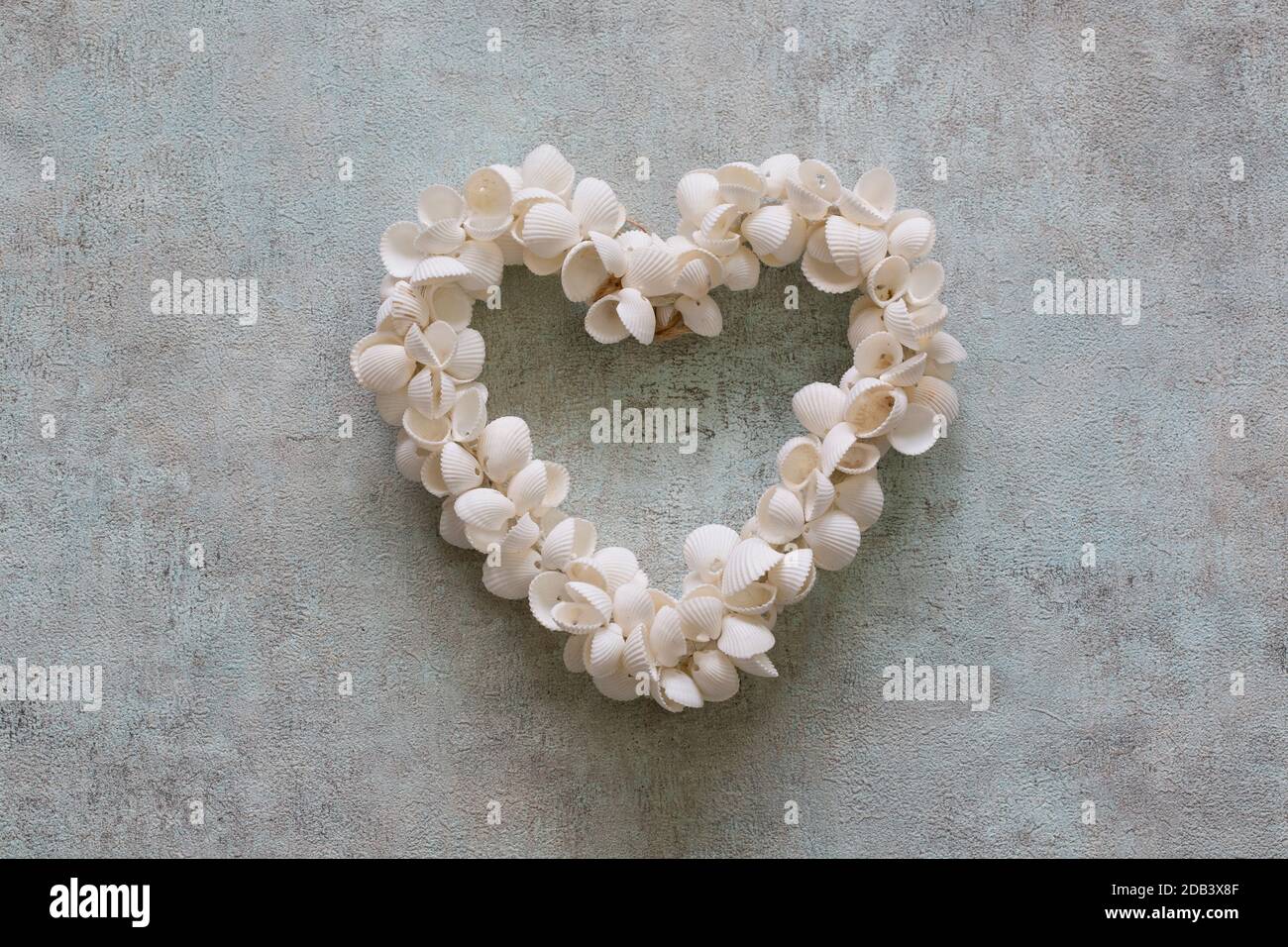 Heart made shells on beach hi-res stock photography and images - Alamy