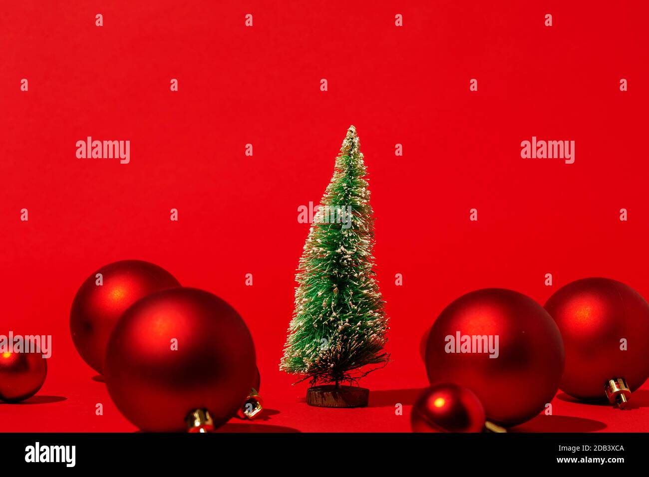 christmas background with hard lighting on red background Stock Photo ...