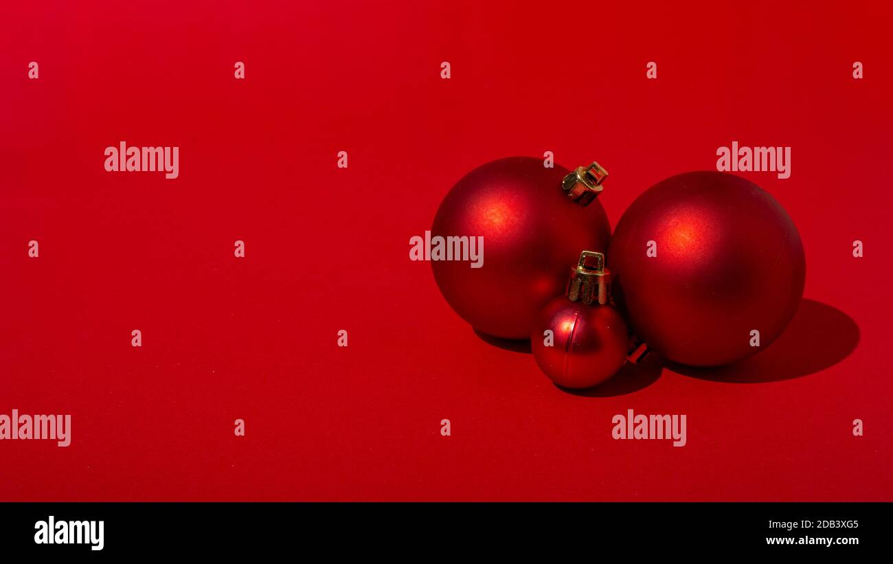 Christmas background with hard lighting on red background Stock Photo ...