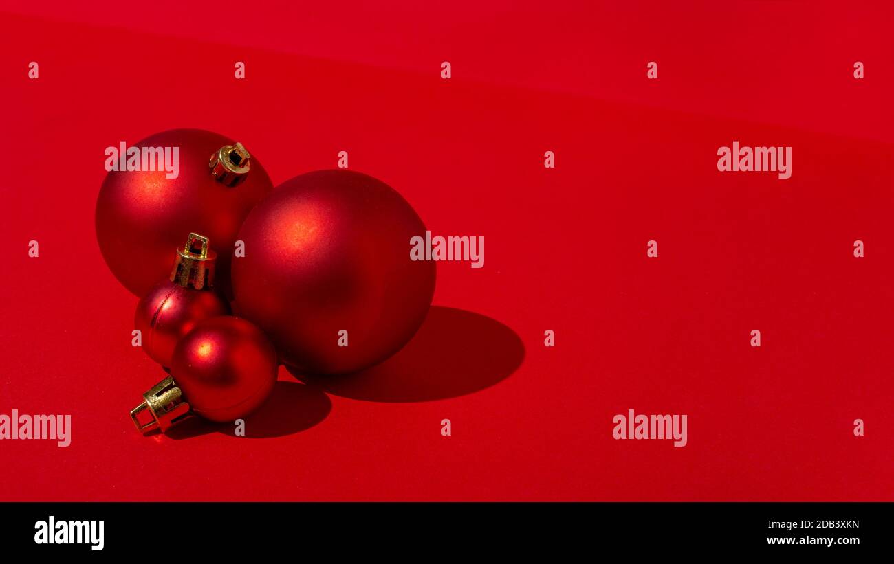 Christmas background with hard lighting on red background Stock Photo ...