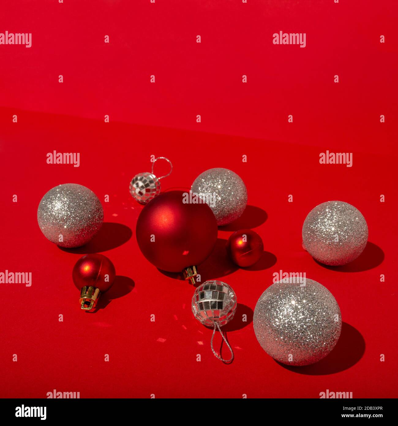 Christmas background with hard lighting on red background Stock Photo ...