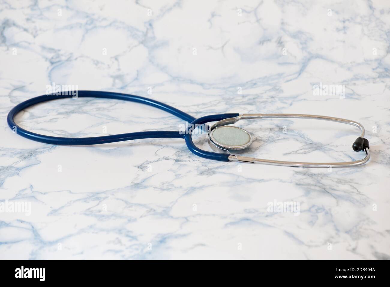 Medical stethoscope or phonendoscope over light blue background Stock Photo - Alamy