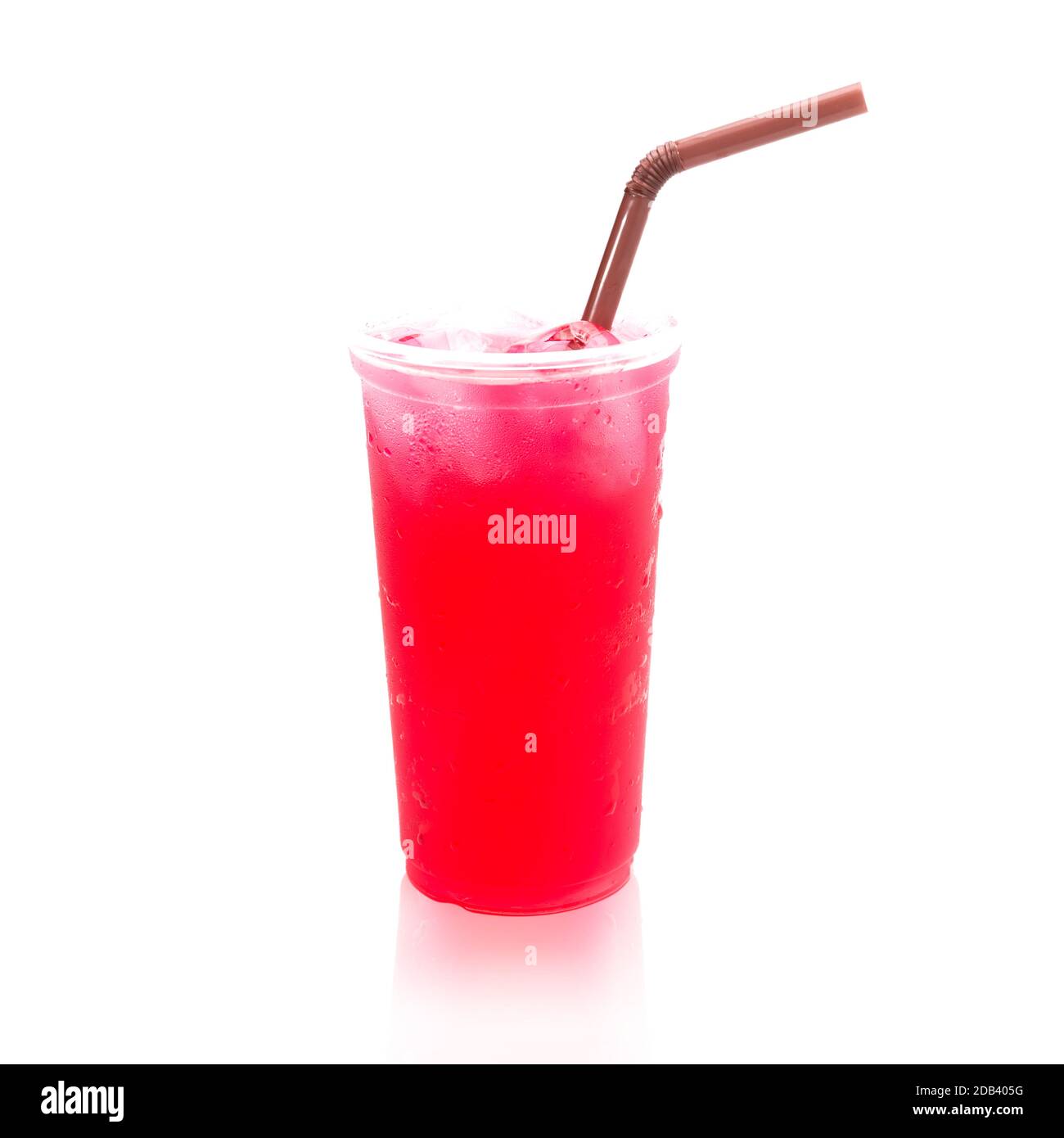 Red syrup water in glass isolated on white background. Food and drink ...
