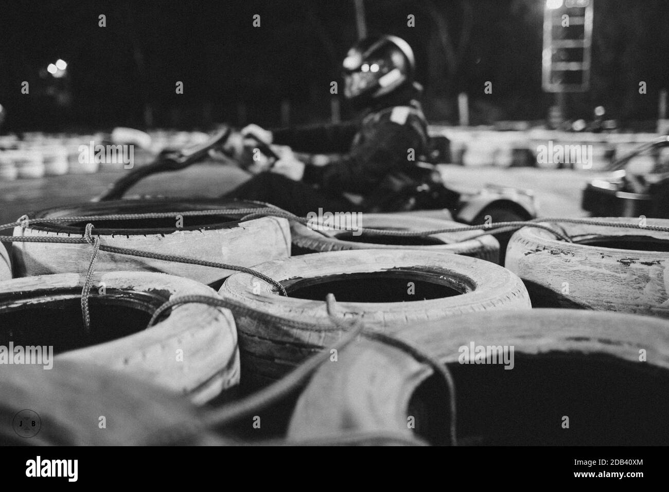 A grayscale shot of tires on a racecar track Stock Photo - Alamy