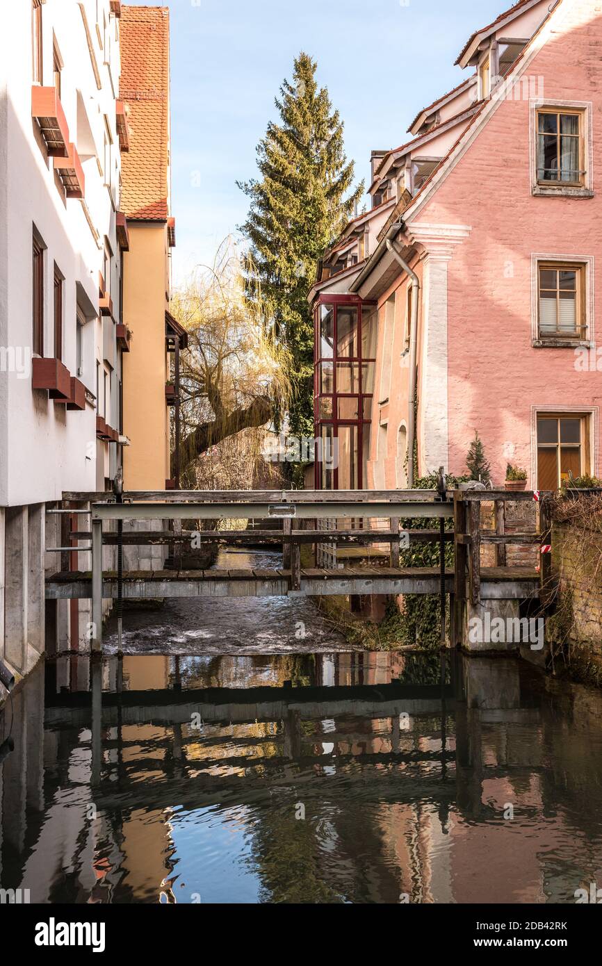 Little bridge between houses of the old section of the town Stock Photo ...