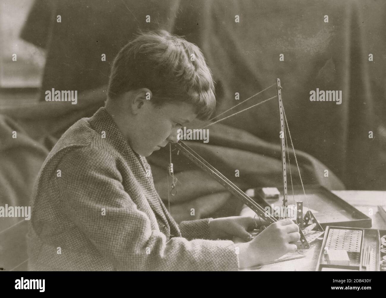 Young Boy with a Mechanical Toy Stock Photo - Alamy