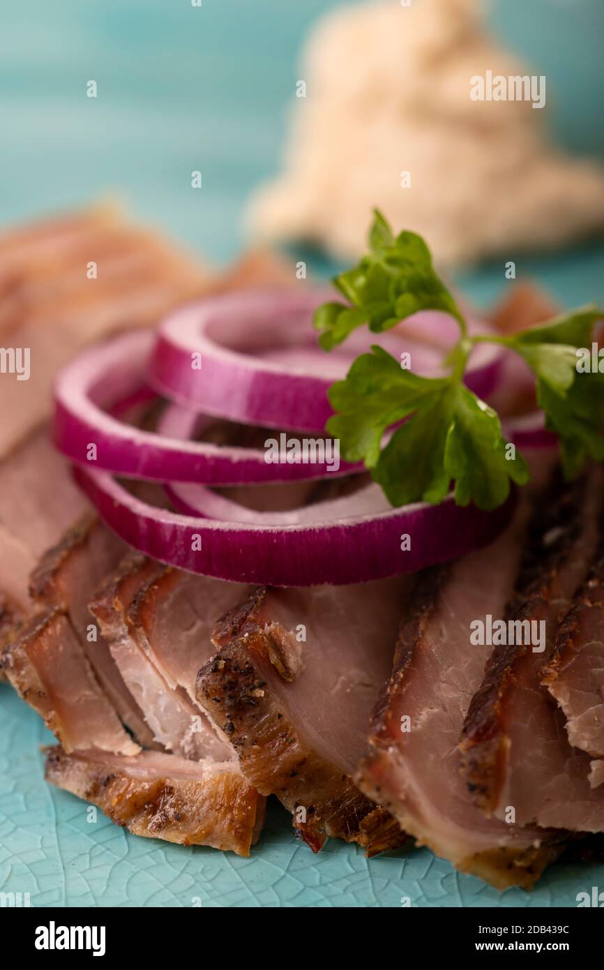 slices of cold roast pork with onions Stock Photo - Alamy