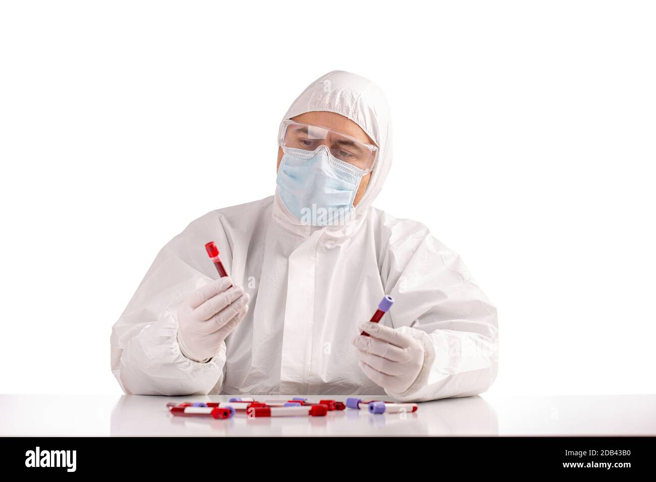 Doctor with a sample blood test tube of Covid-19 Stock Photo - Alamy