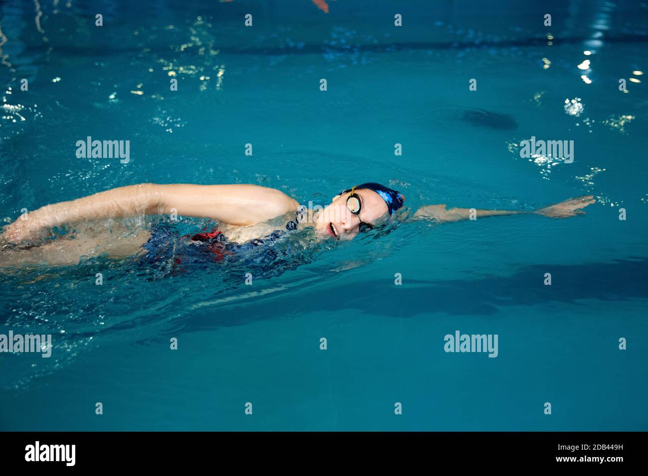 Woman swimming in pool lap hi-res stock photography and images - Alamy
