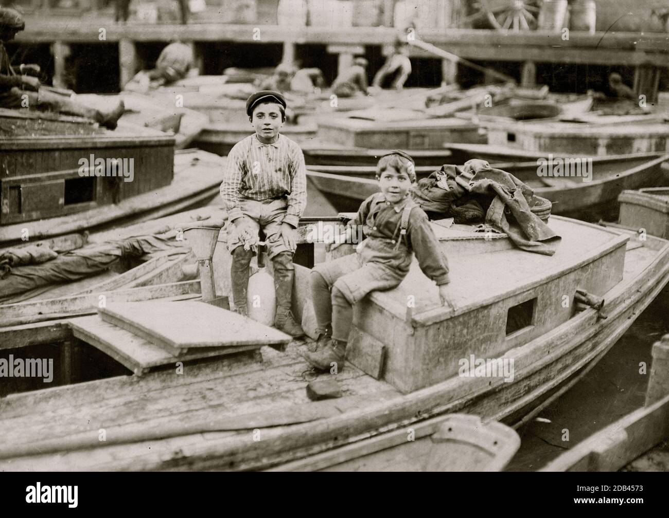 Fisher Boys Playing Truant on their Father's Smacks Stock Photo - Alamy