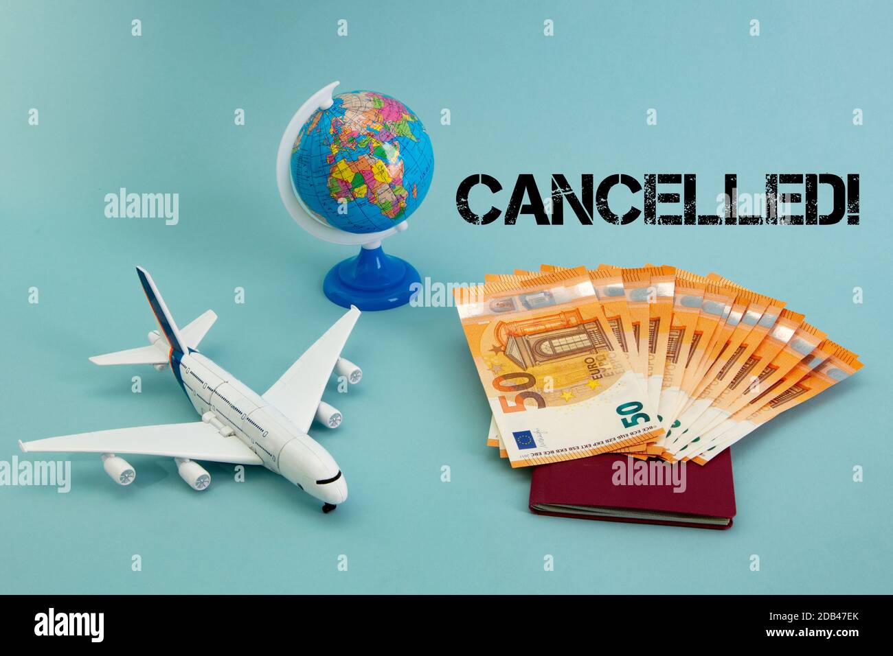 Concept: Holiday cancellation insurance with toy airplane and globe ...