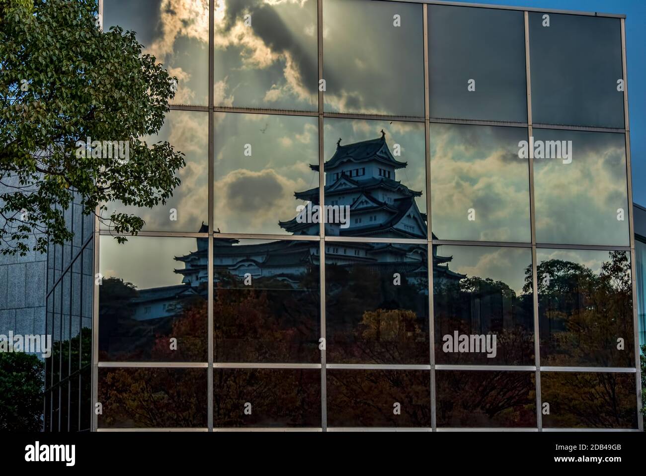 Himeji castle reflected in the History Museum windows, called the White ...