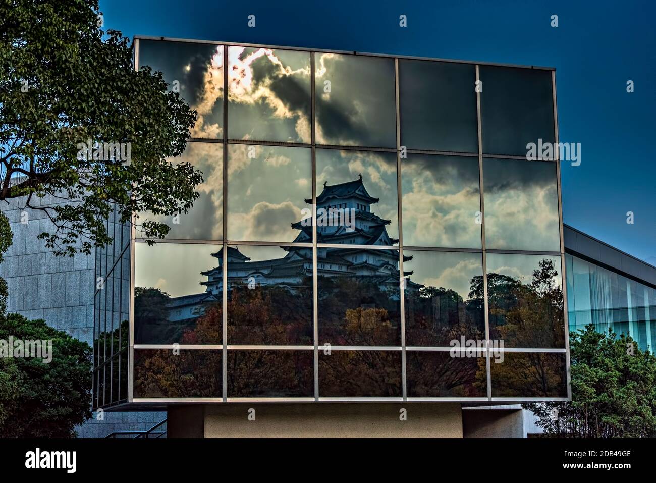 Himeji castle reflected in the History Museum windows, called the White ...