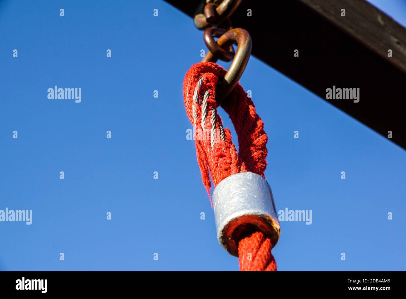 Detail of rope end anchored into hooks Stock Photo - Alamy