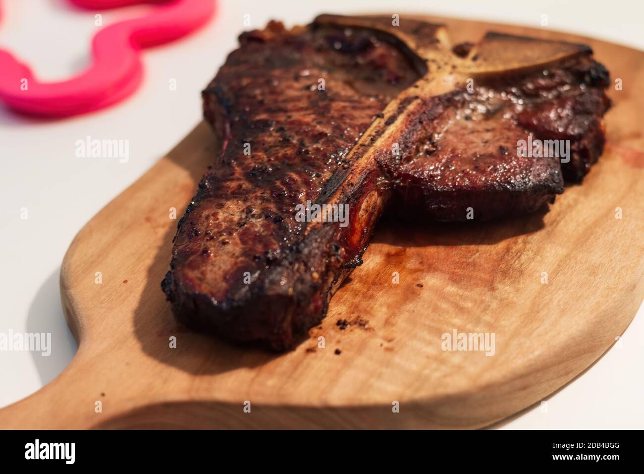 Grilled prime T-Bone marbled beef steak on a plate Stock Photo - Alamy