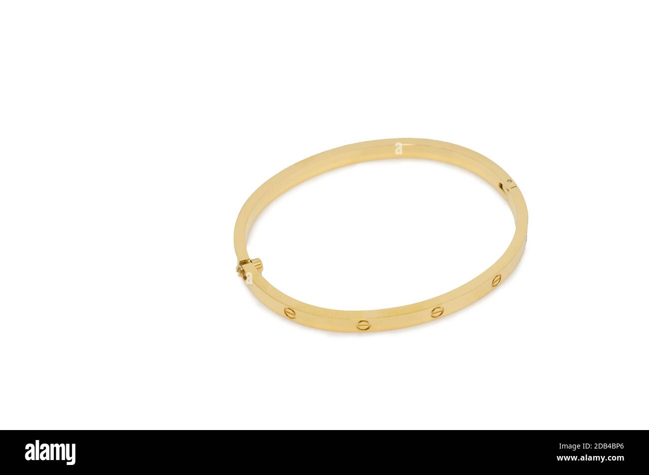 Gold bangle on the white background Stock Photo - Alamy