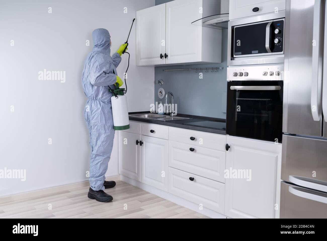 Exterminator spraying hi-res stock photography and images - Alamy
