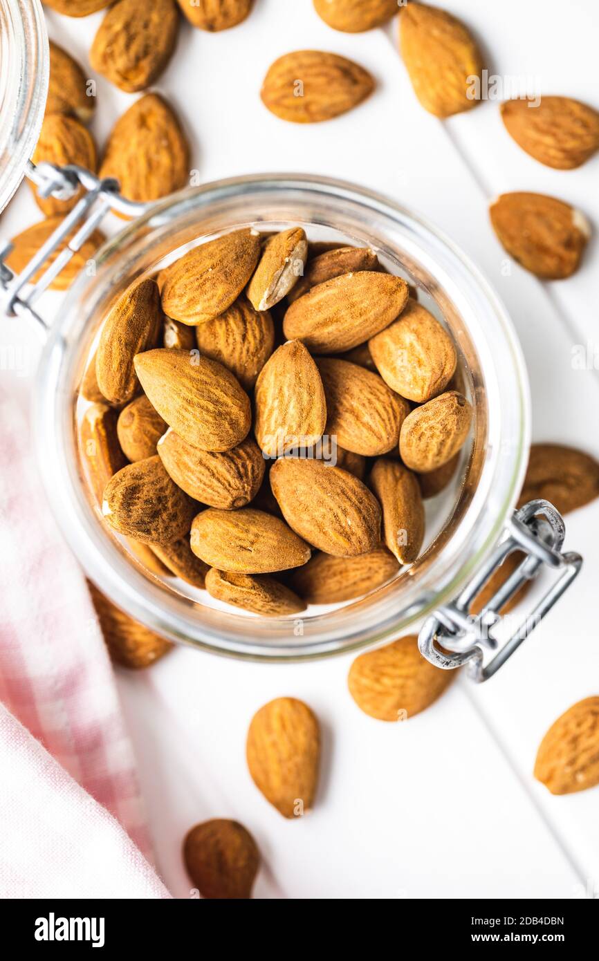 Dried almonds nuts in jar. Top view Stock Photo - Alamy