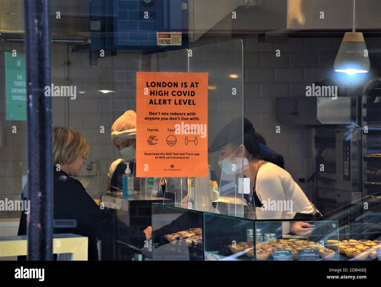 Open shop sign face covering hi-res stock photography and images - Alamy