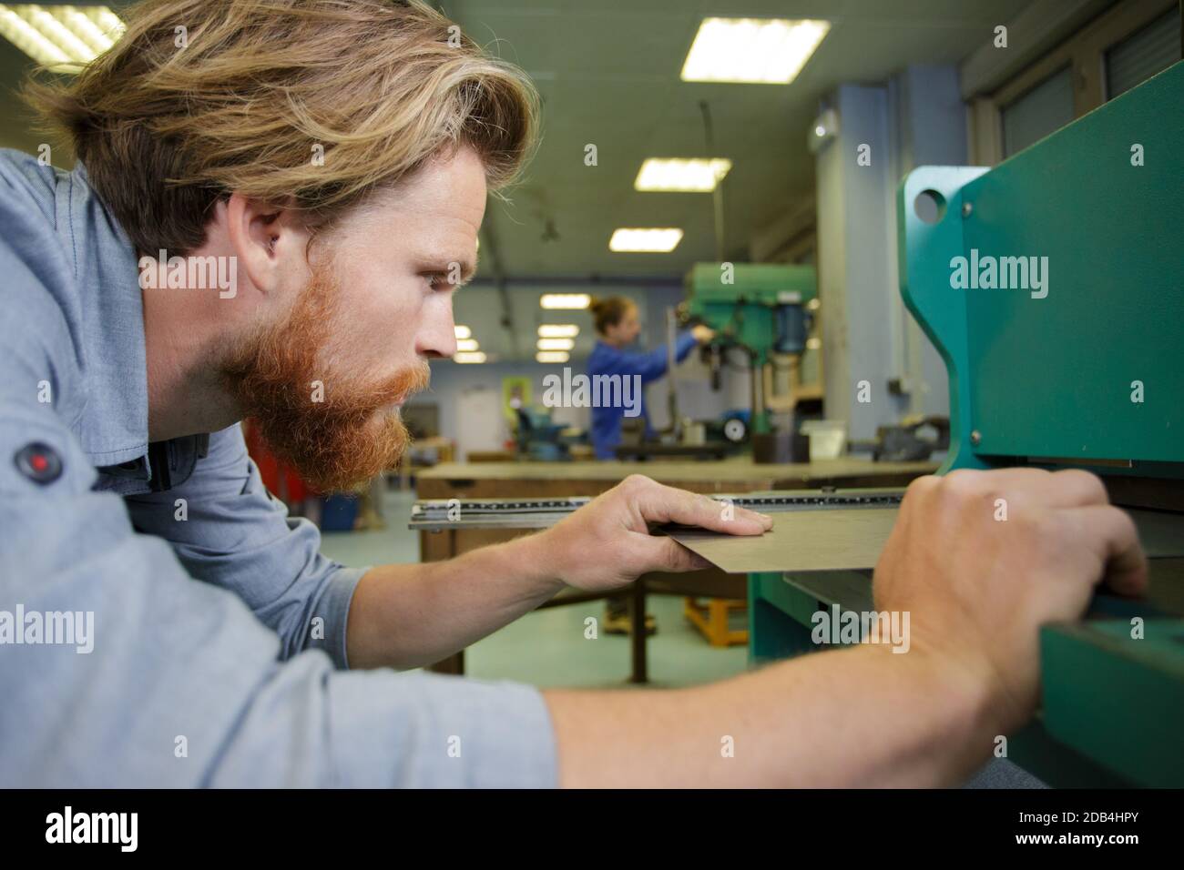 process of bending sheet metal on a sheet bending machine Stock Photo ...