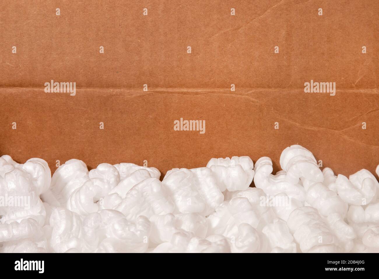 Polystyrene or white styrofoam packing pieces used for minimize bumps ...