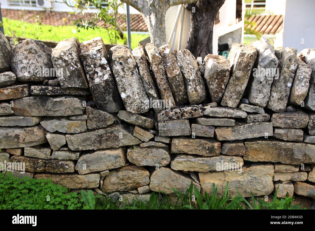 traditional slate stone wall on portuguese countryside on the algarve ...