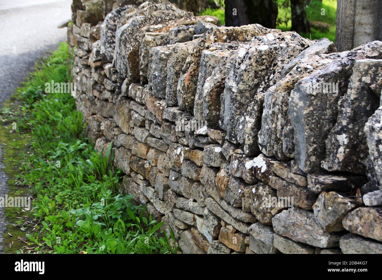 traditional slate stone wall on portuguese countryside on the algarve ...