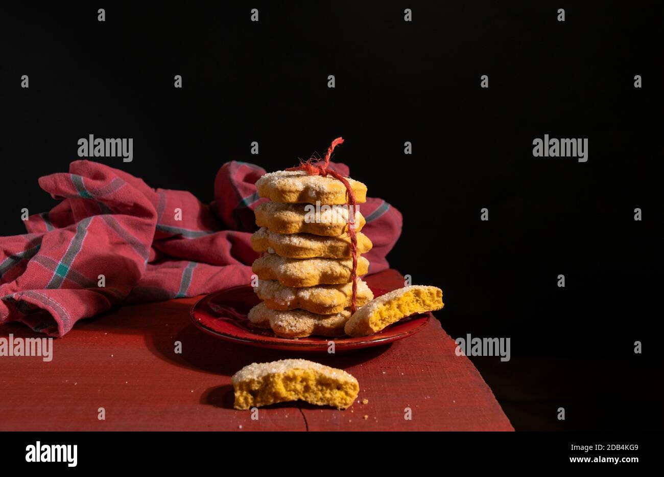 Set Biscuits on Red Wooden table on the black background Stock Photo ...