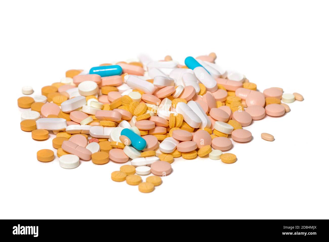 Assorted mix of pills over a white background Stock Photo - Alamy
