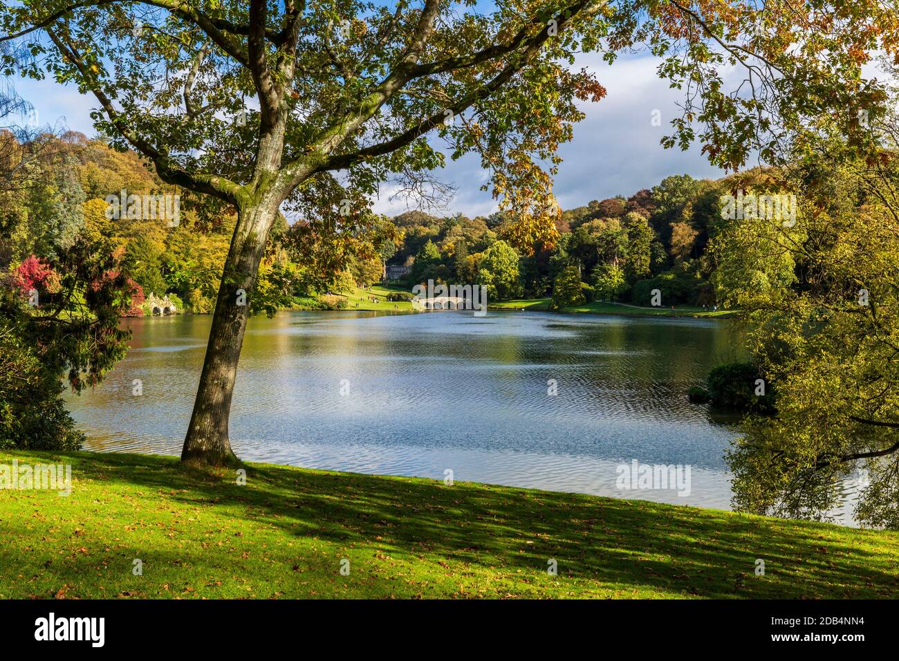 Autumn colour across the lake at Stourhead in Wiltshire, England Stock ...
