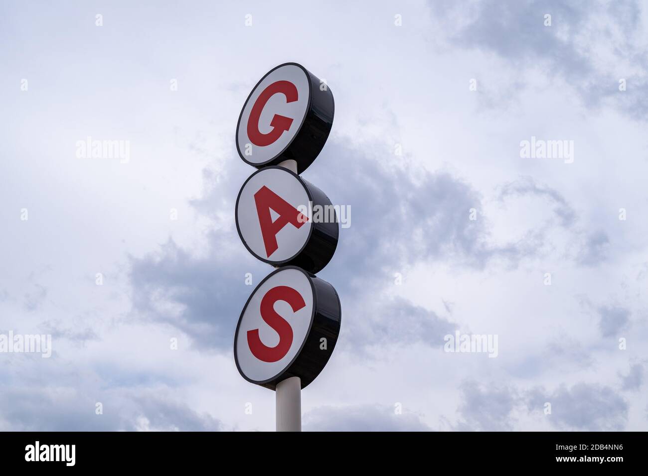 Generic gas station sign against a cloudy sky Stock Photo - Alamy