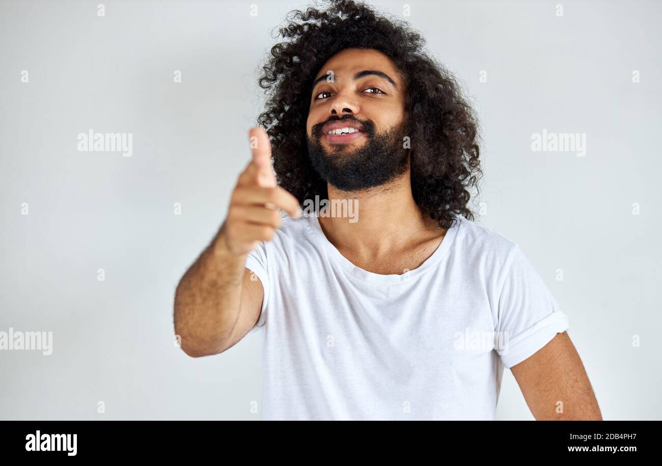 friendly guy point finger at camera isolated over white background ...